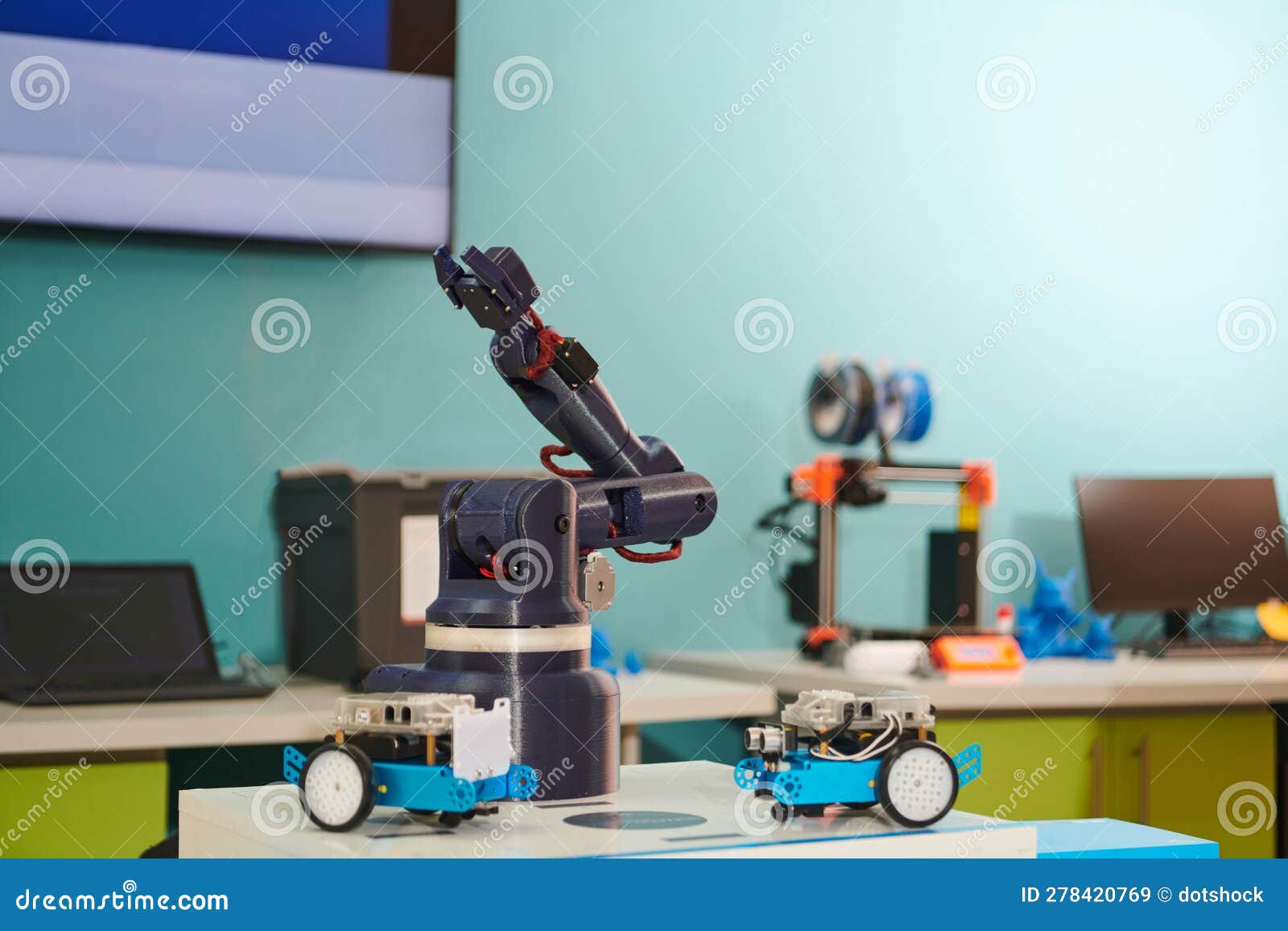 Modern Equipment for Robotics and a 3d Printer for Modeling on a Table ...