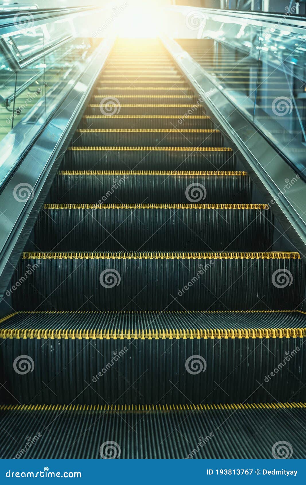 An Escalator Is A Moving Staircase Which Carries People Between Floors ...