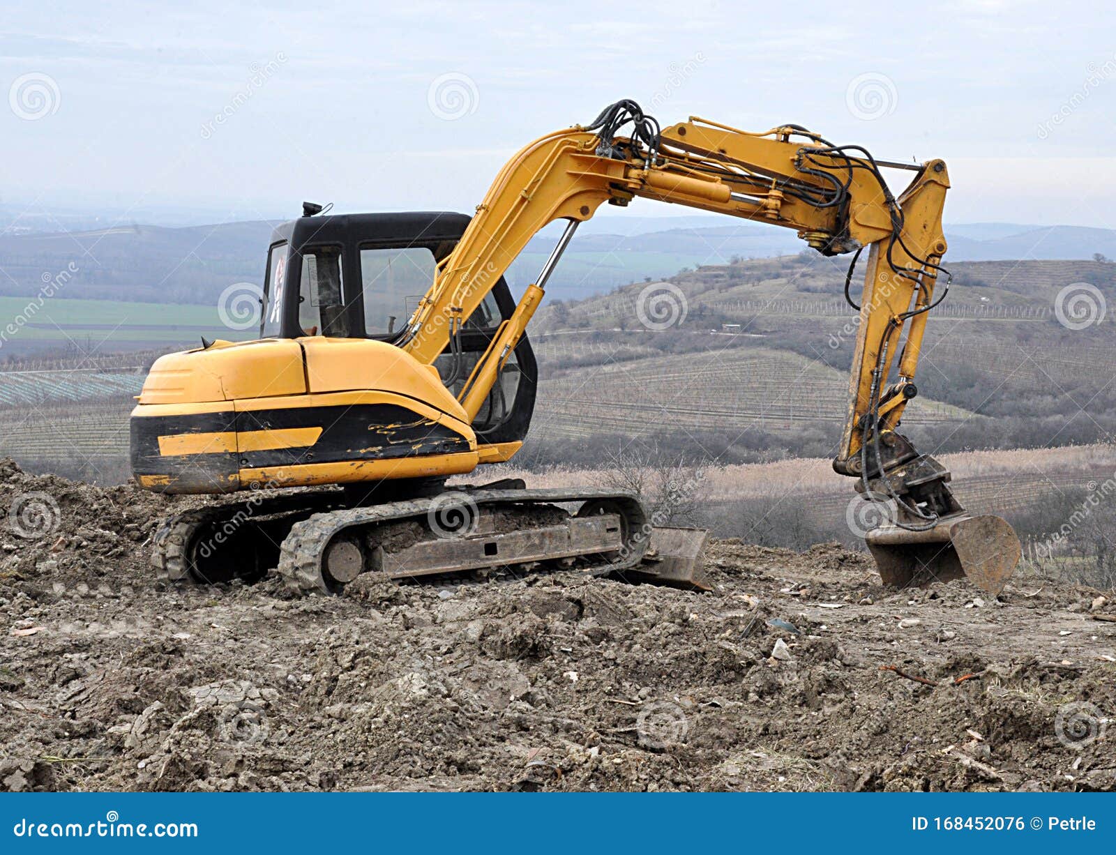 Modern excavator stock photo. Image of garden, excavator - 168452076