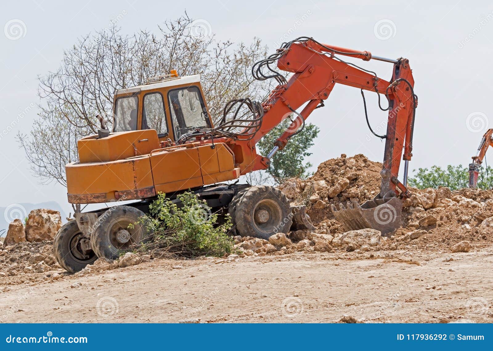 Modern Excavator Performs Excavation Work Stock Photo - Image of ...