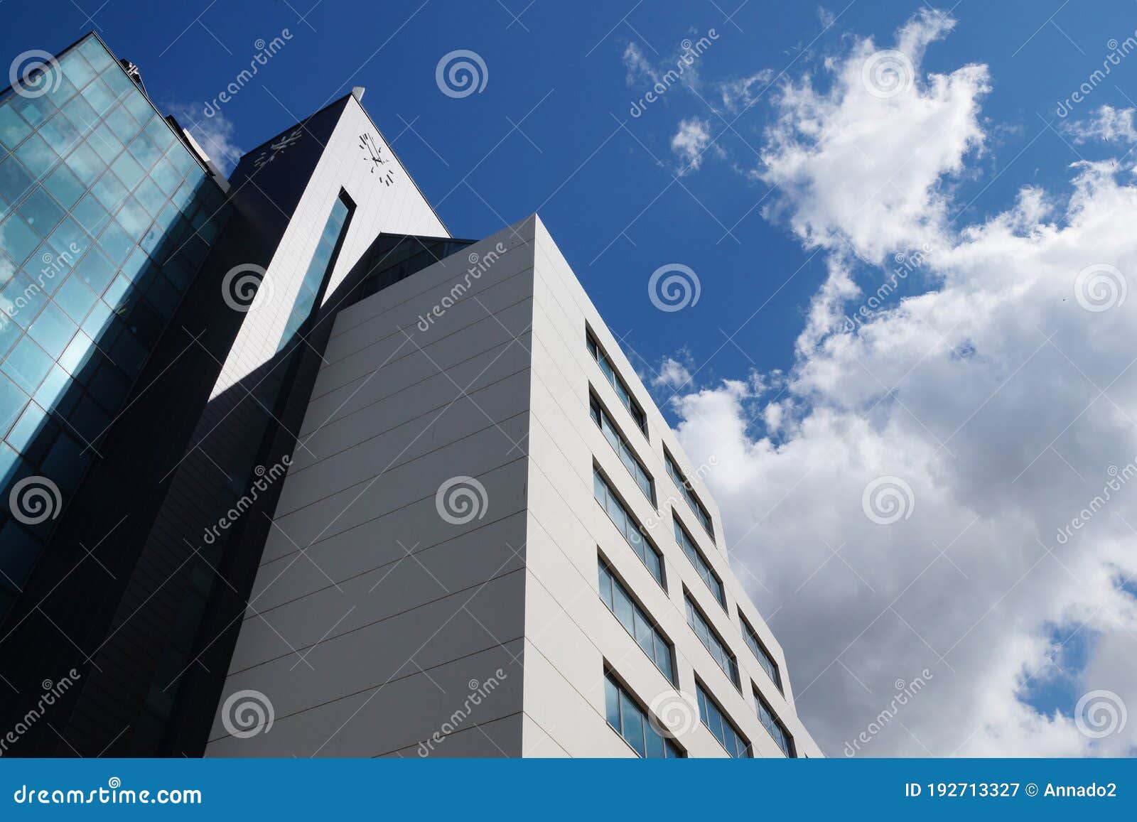Modern Facade of a Skyscraper Against the Backdrop of a Cloudy Sky ...