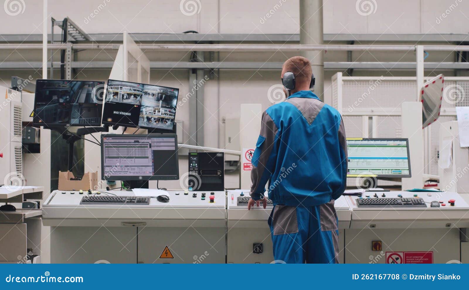 Modern Factory: a Male Operator Manages the Production Line of an ...
