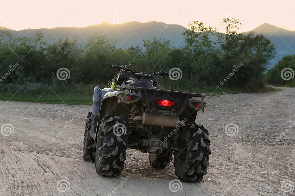 Modern Fast Quad Bike on Pathway Outdoors Stock Photo - Image of ...