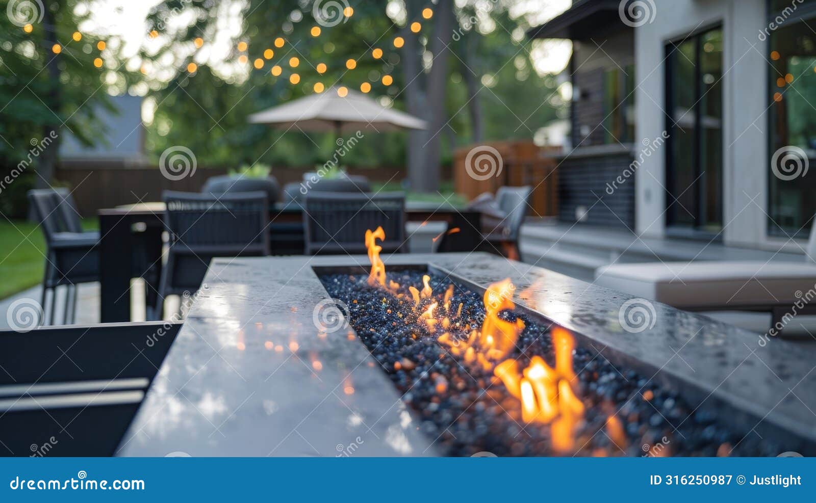 A Modern Fire Pit is the Statement Piece in this Sleek Outdoor Dining ...
