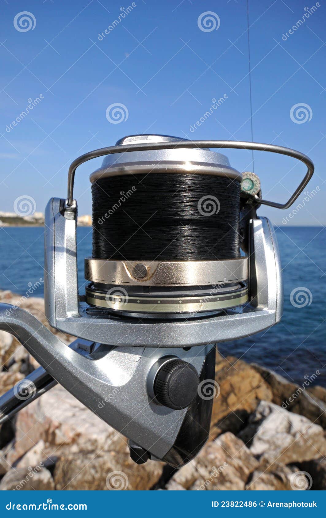Modern fishing reel stock photo. Image of blue, knob - 23822486