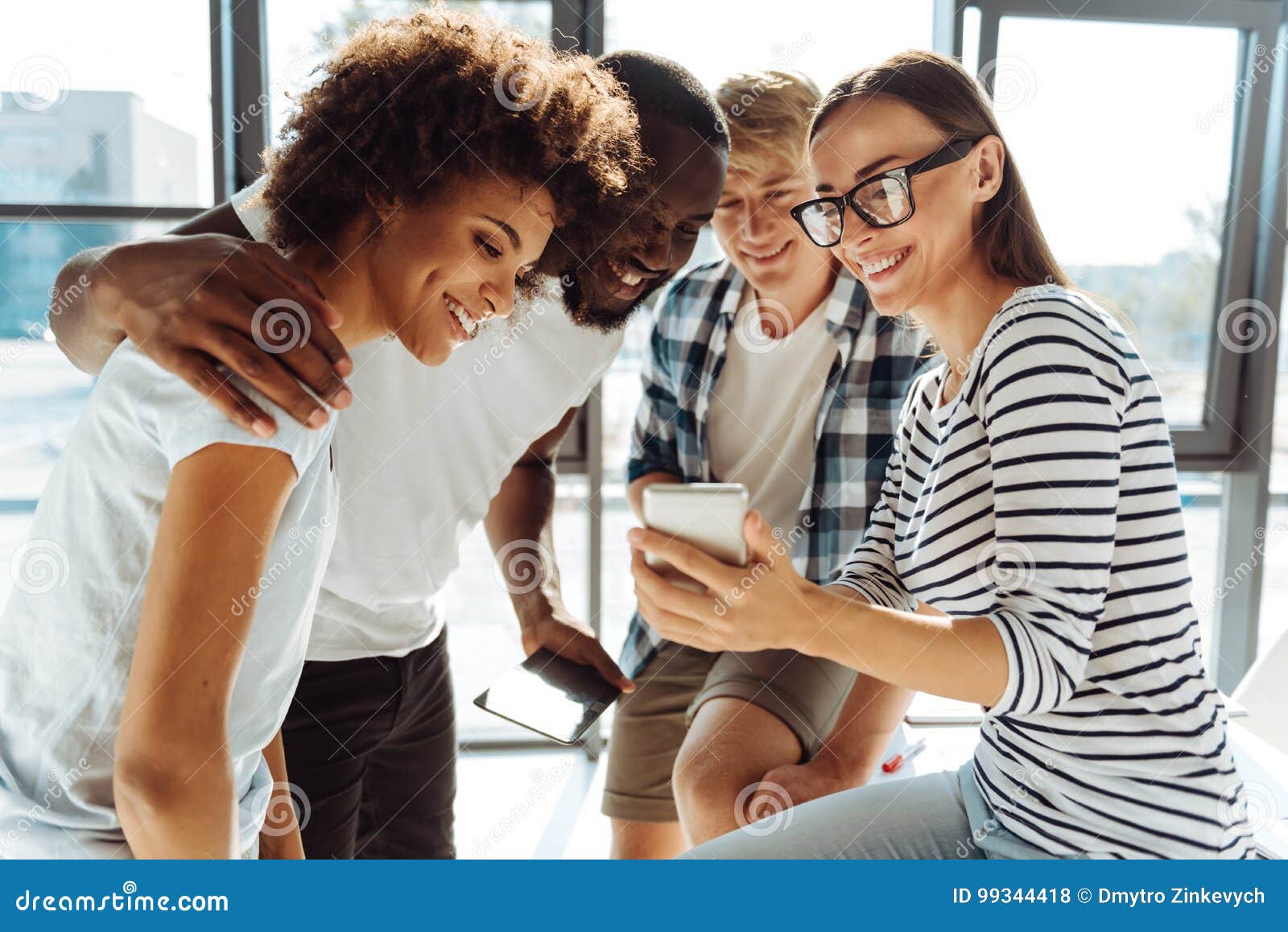 Joyful Students Using Smart Phone Stock Photo - Image of rest ...