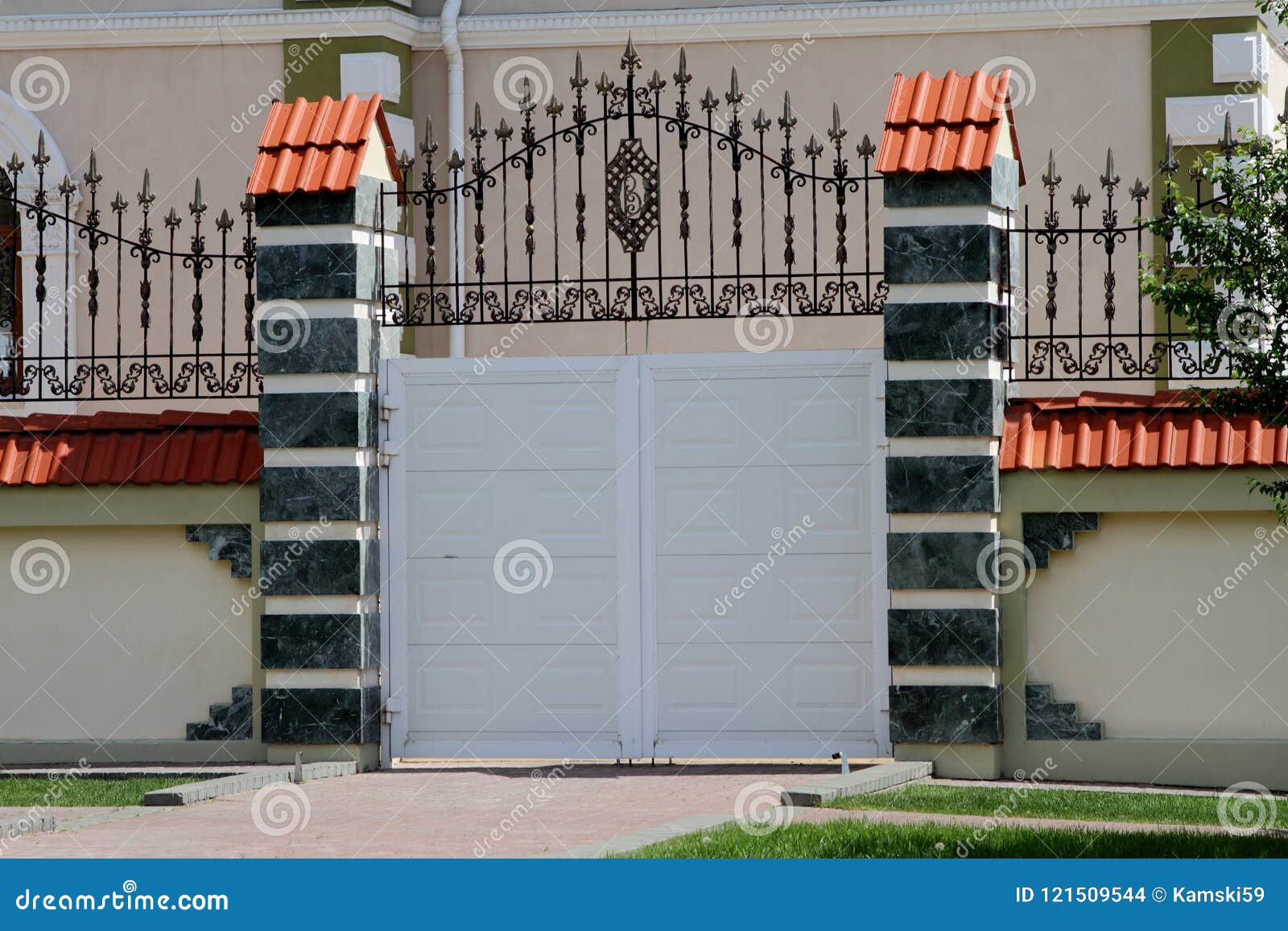 Modern Gates Framed by Marble Columns. Stock Photo - Image of estate ...