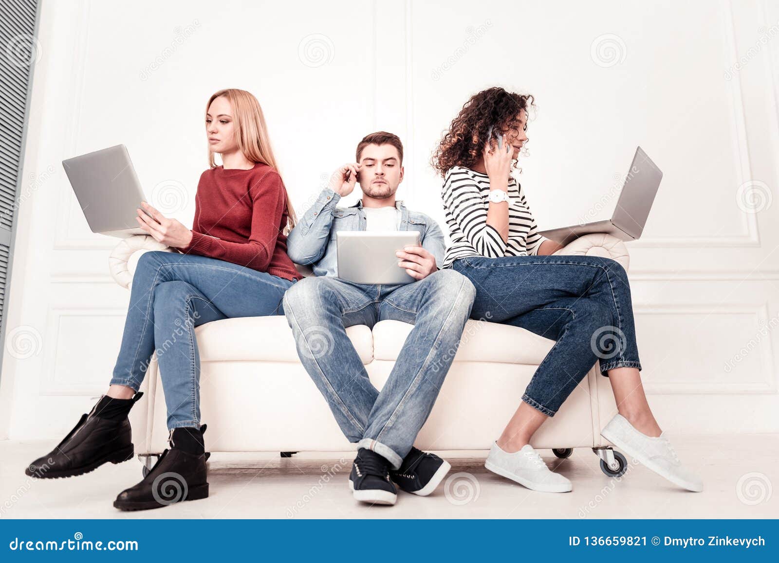 Smart Young People Using Their Laptops Stock Image - Image of college ...