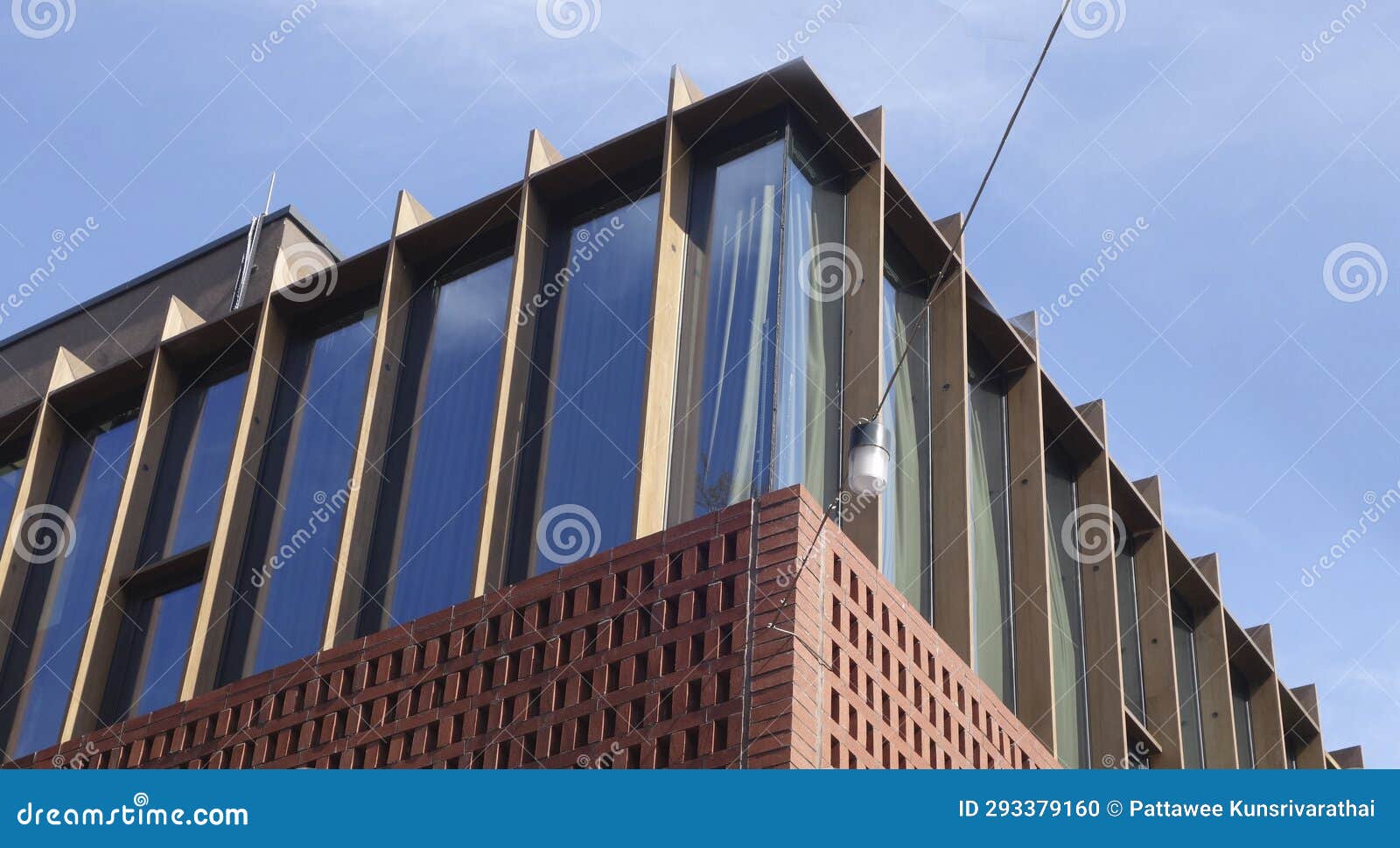Modern Geometric Building Against Blue Sky in Low Angle and Perspective ...