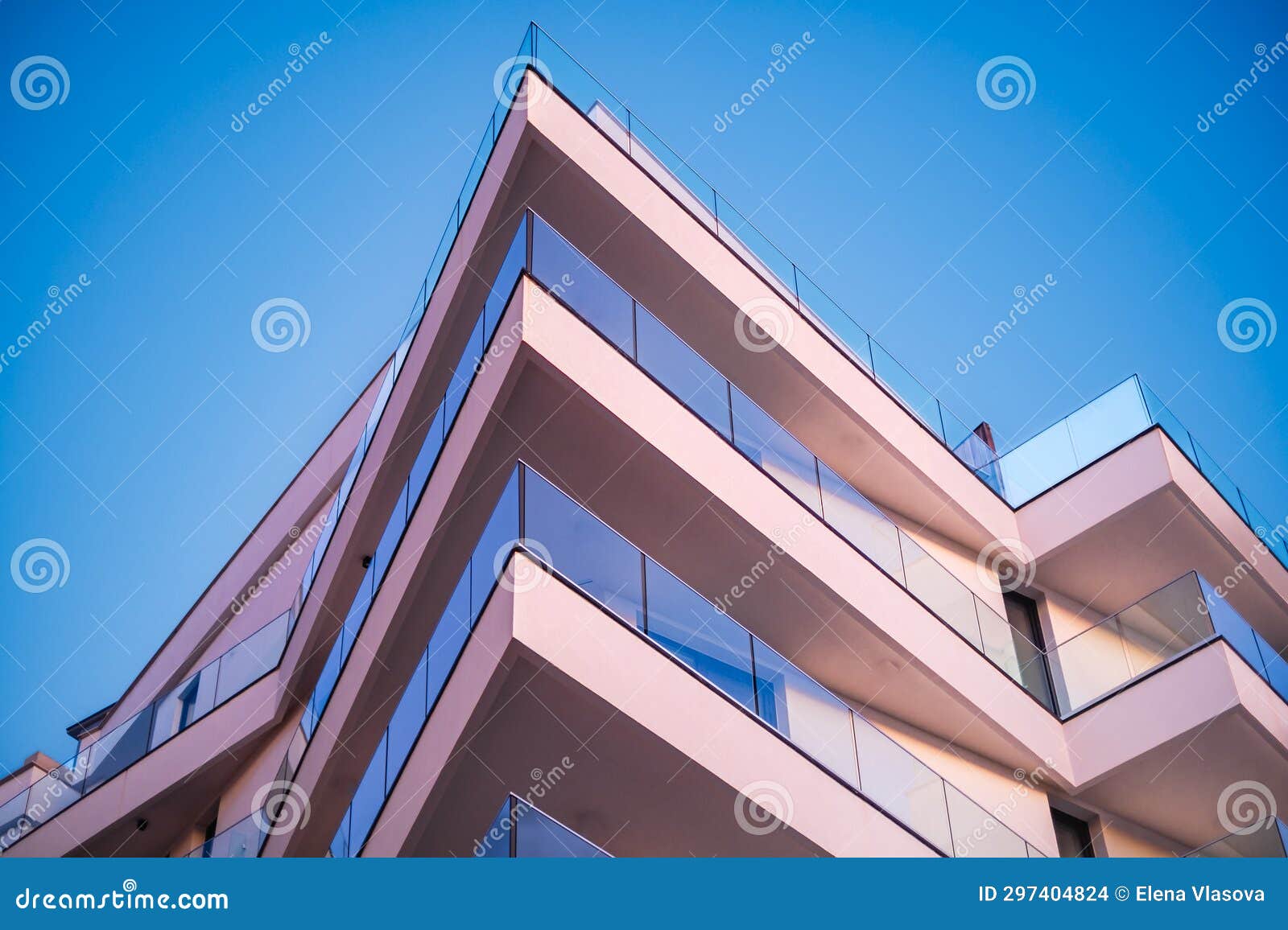 Modern Geometric Building Against Blue Sky in Low Angle and Perspective ...