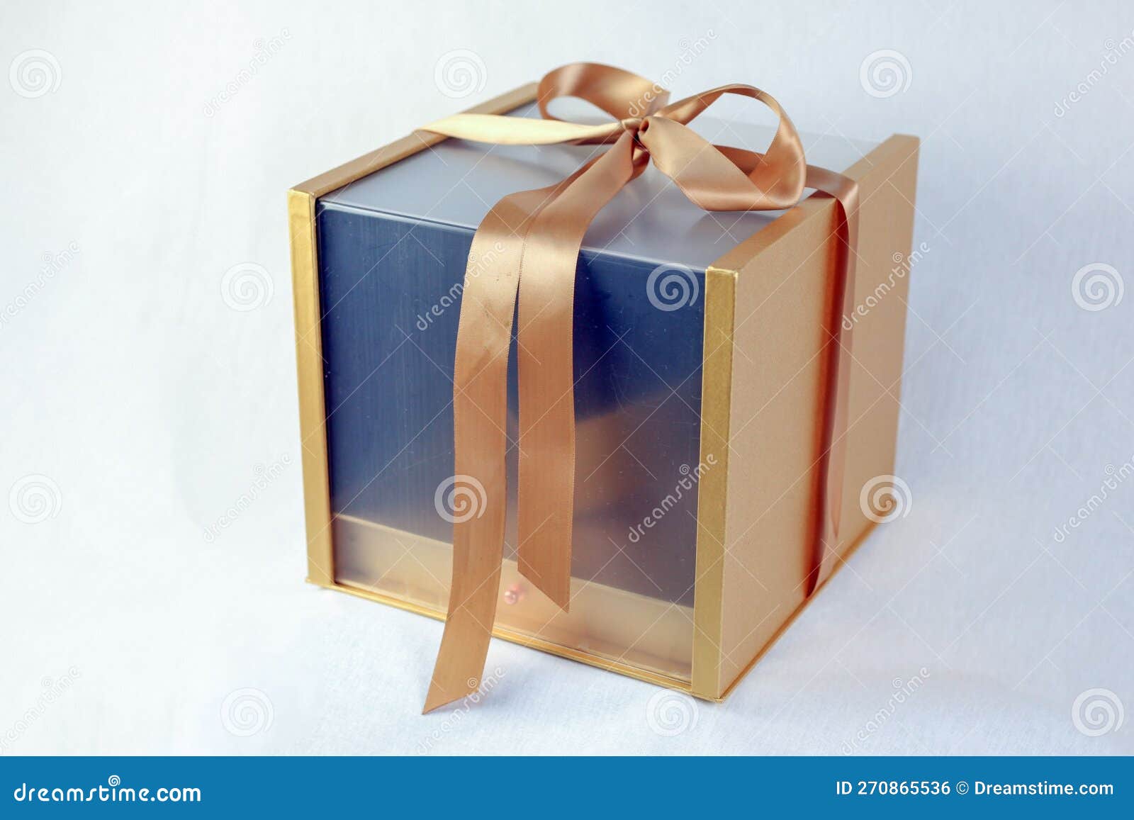 Modern Gift Box with a Shiny Silver Bow on Top Stock Photo - Image of ...