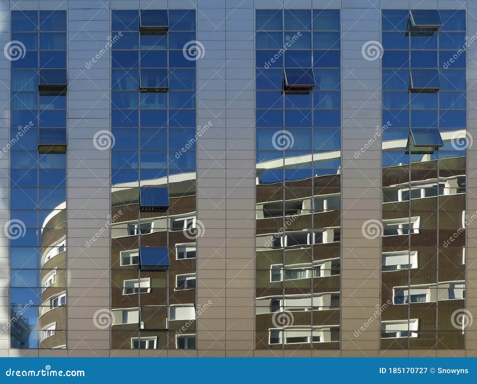 Modern Glass Building with Reflection of Other Building Stock Image ...