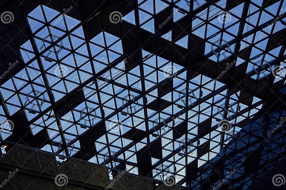 Modern Glass Ceiling with Triangular Pattern Against Blue Sky. Stock ...