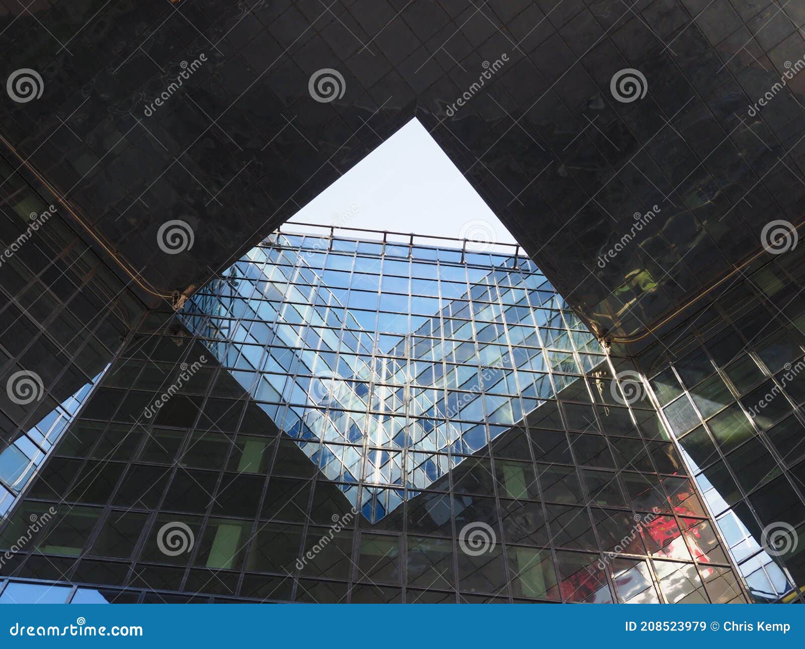 A Modern Glass Skyscraper Office Building Looking Up at Triangular Gap ...
