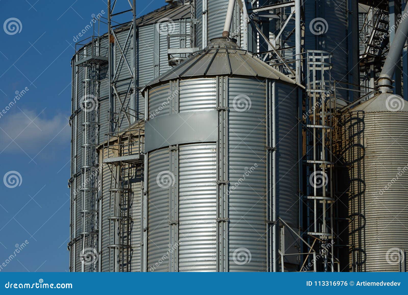 Modern Grain Terminal. Metal Tanks of Elevator. Grain-drying Complex ...