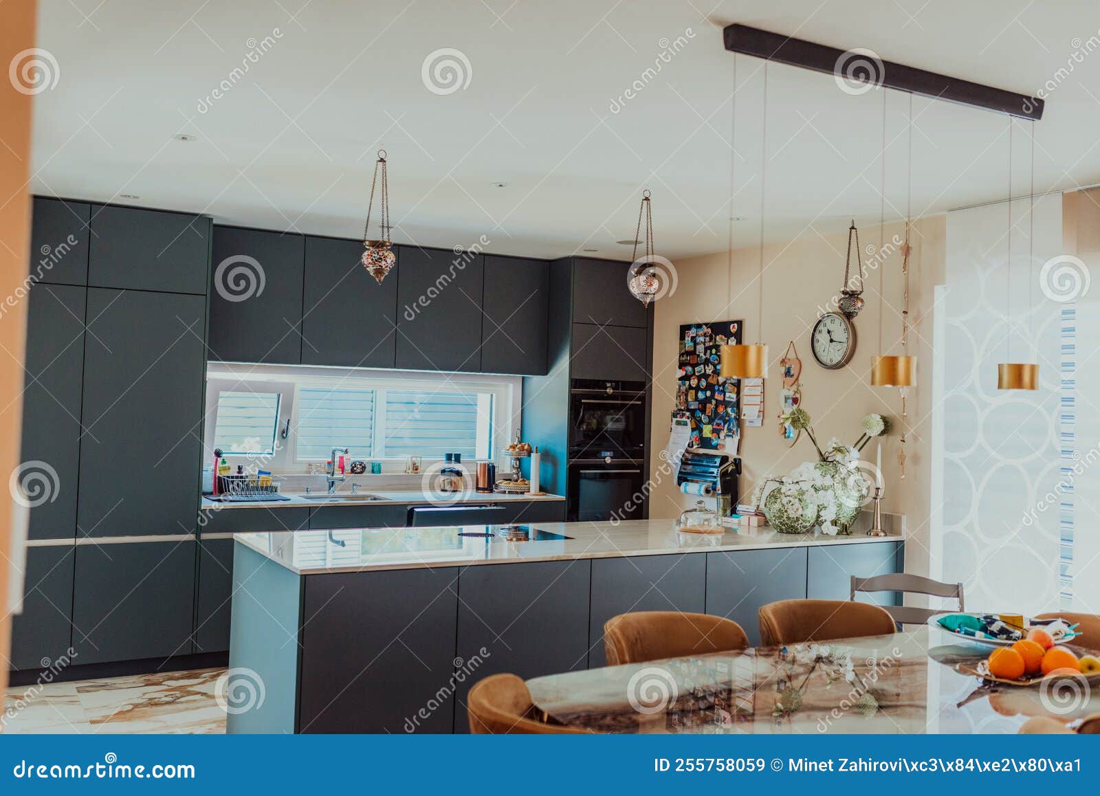 Modern Gray Kitchen with Electronic Devices and Decorative Items Stock ...