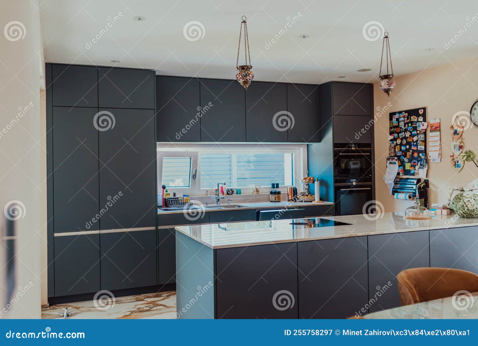 Modern Gray Kitchen with Electronic Devices and Decorative Items Stock ...