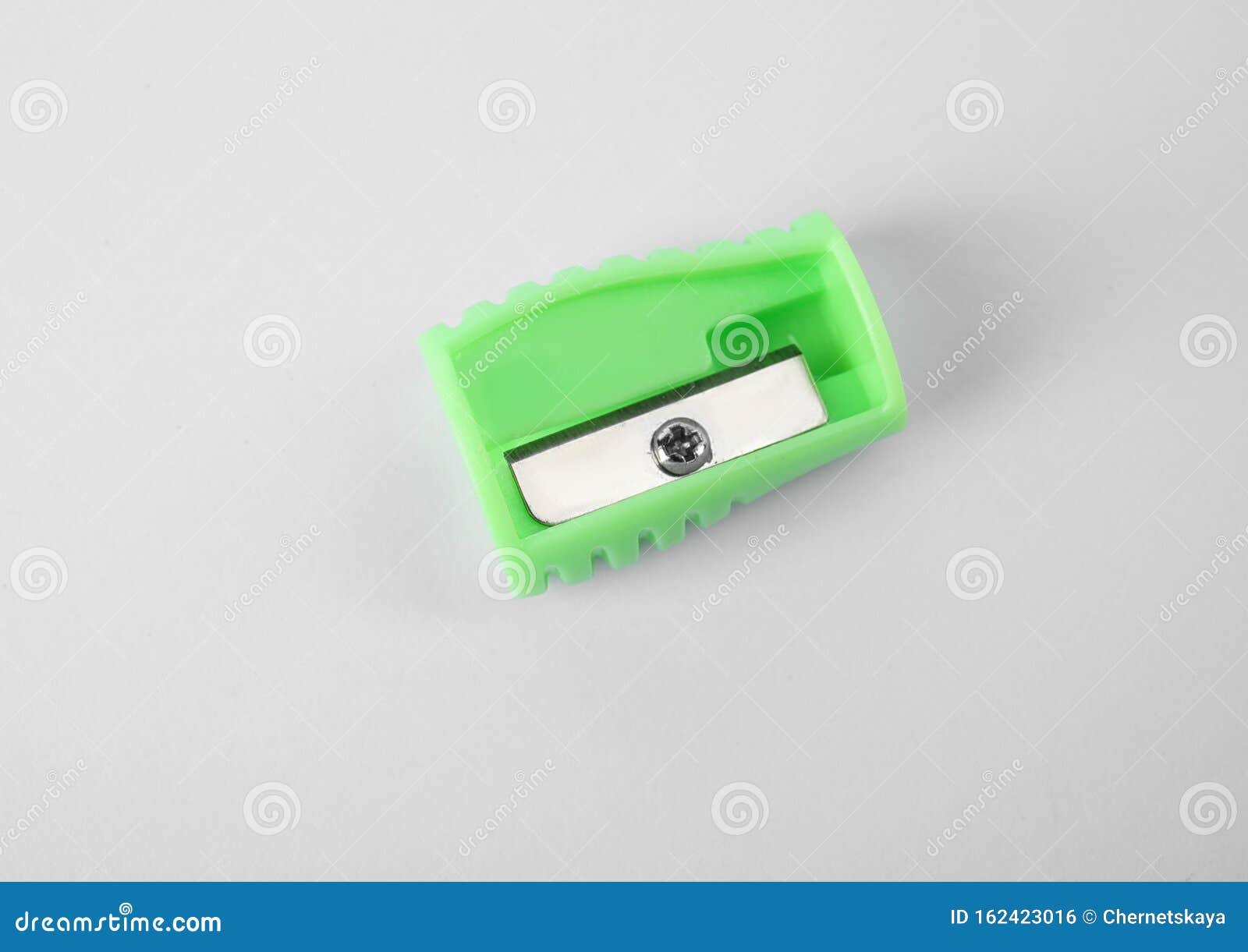 Modern Green Pencil Sharpener on Background Stock Photo - Image of ...