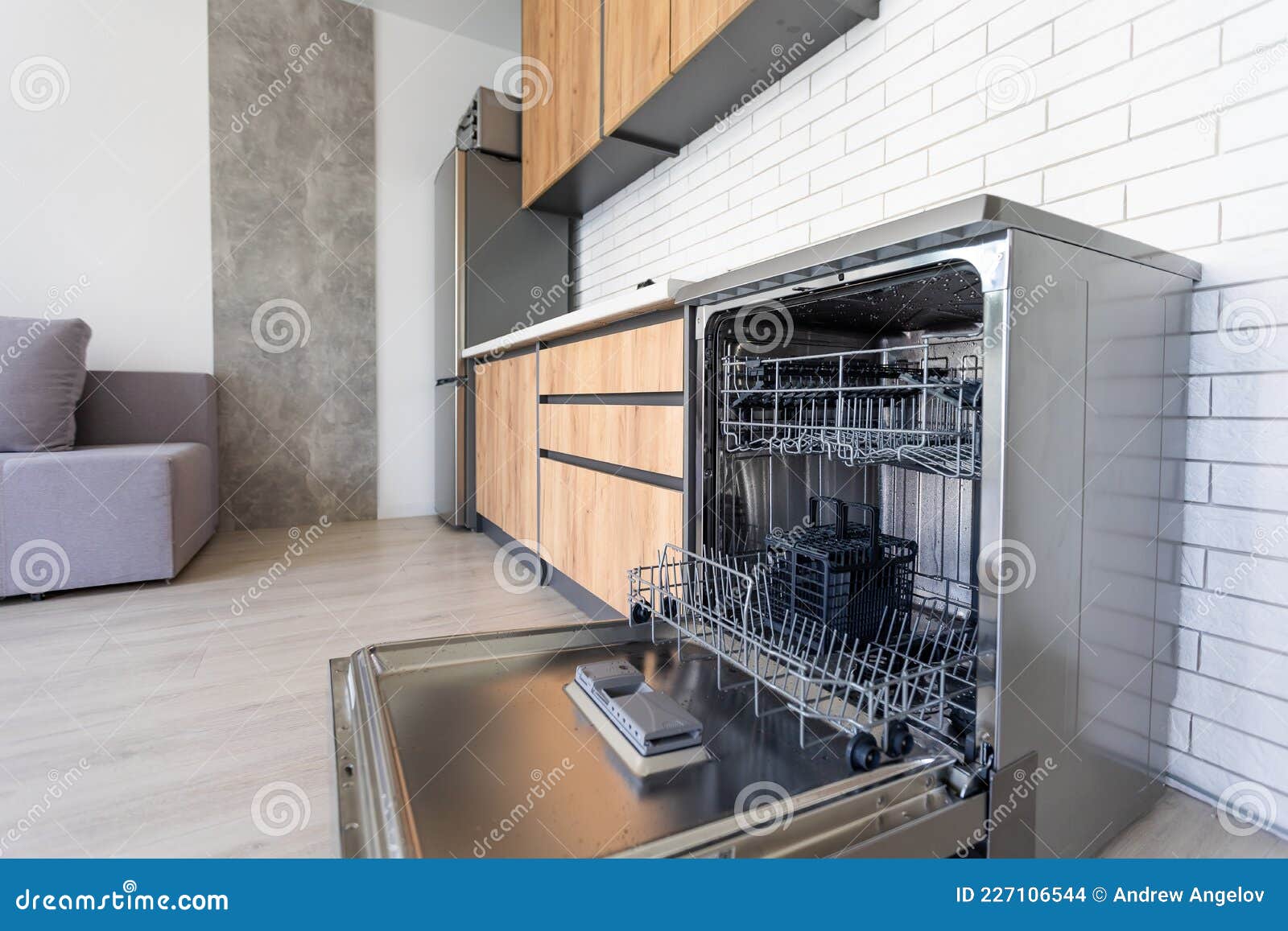 Modern Half Open Empty Dishwasher in a Modern Kitchen Stock Photo ...