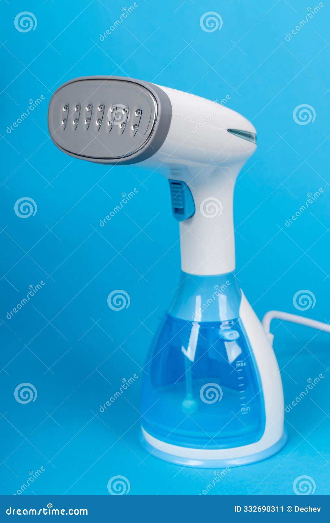 Modern Handheld Steamer for Clothes on Blue Background Stock Image ...