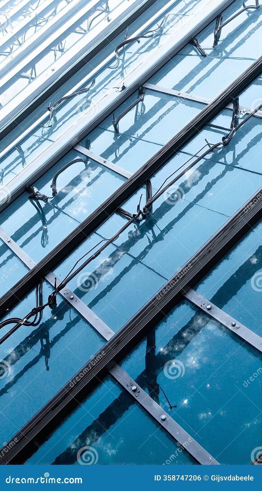 Modern High Rise Structure With Bold Diagonal Bracing On Glass Facade ...