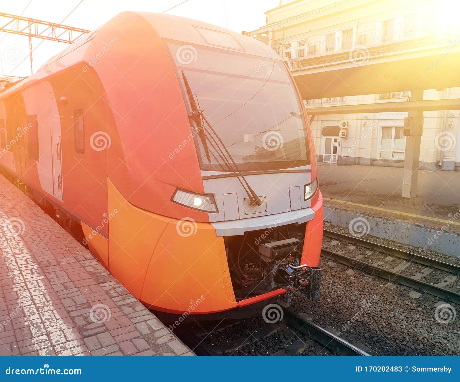 Modern High Speed Red Commuter Train at Railway Platform Stock Image ...