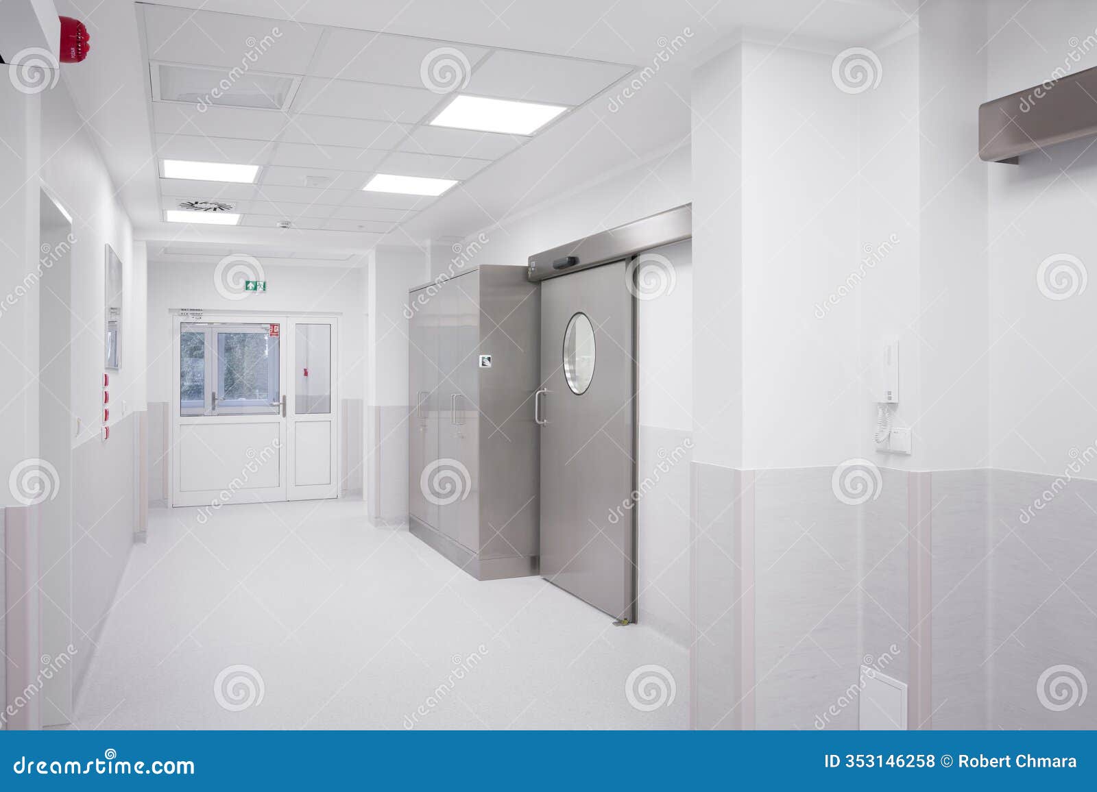 Modern Hospital Hallway with Stainless Steel Door and Exit Sign Stock ...