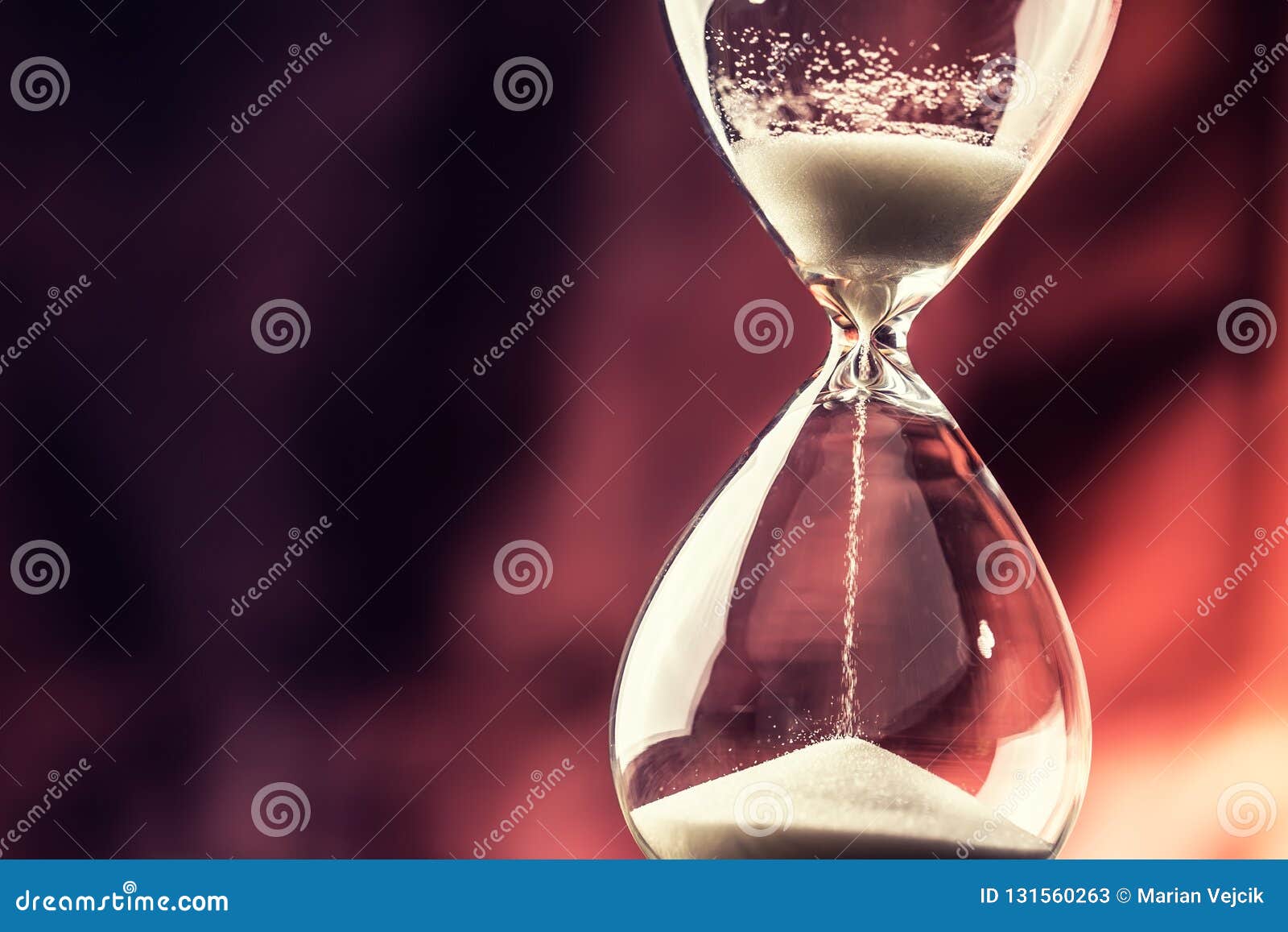 Modern Hourglass in Running Time on Wooden Table Stock Image - Image of ...