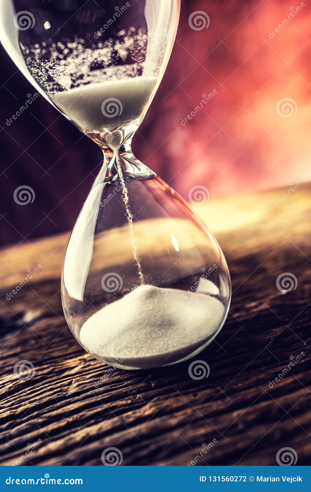 Modern Hourglass in Running Time on Wooden Table Stock Photo - Image of ...