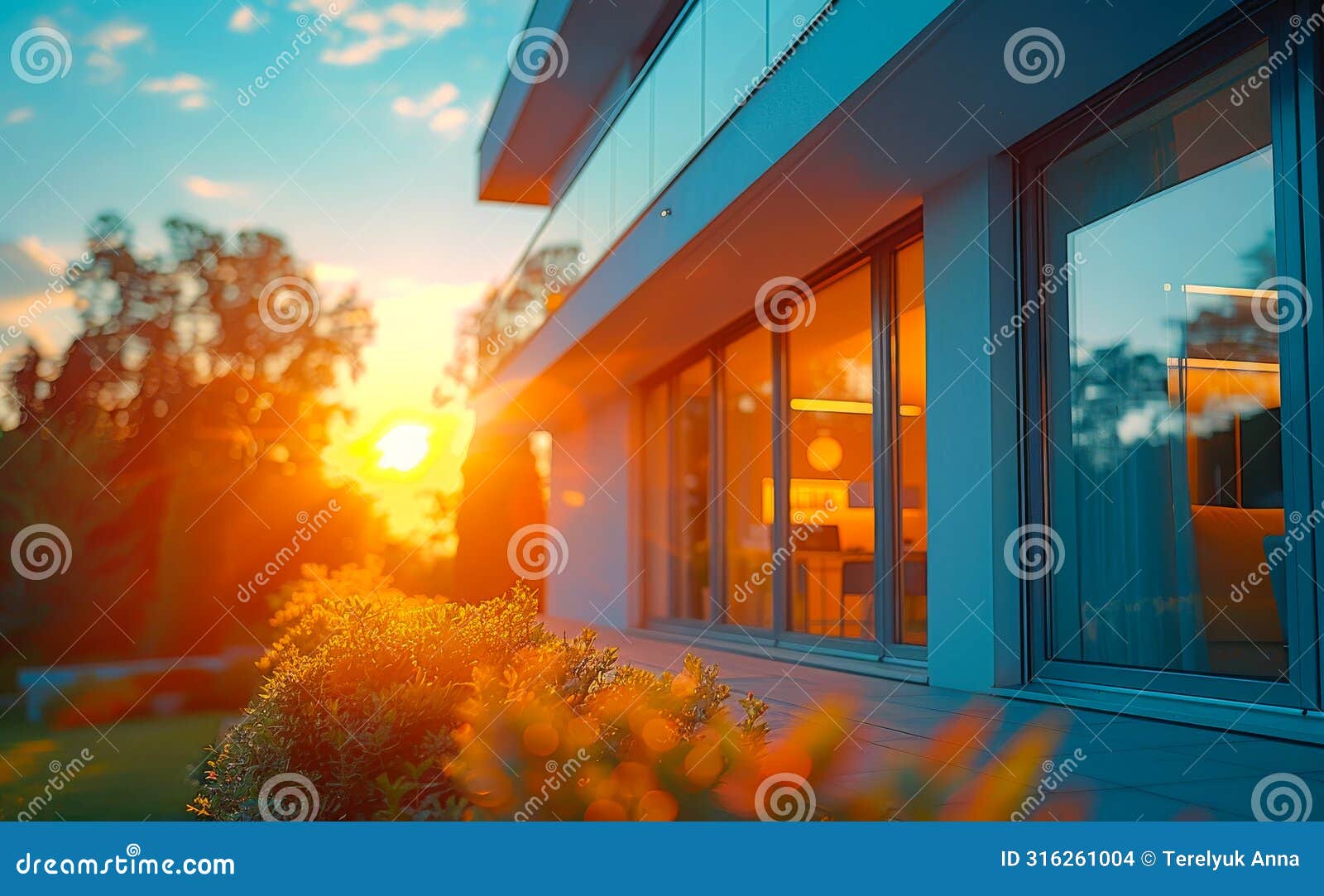Modern House with Big Windows. the Sun is Setting Stock Photo - Image ...
