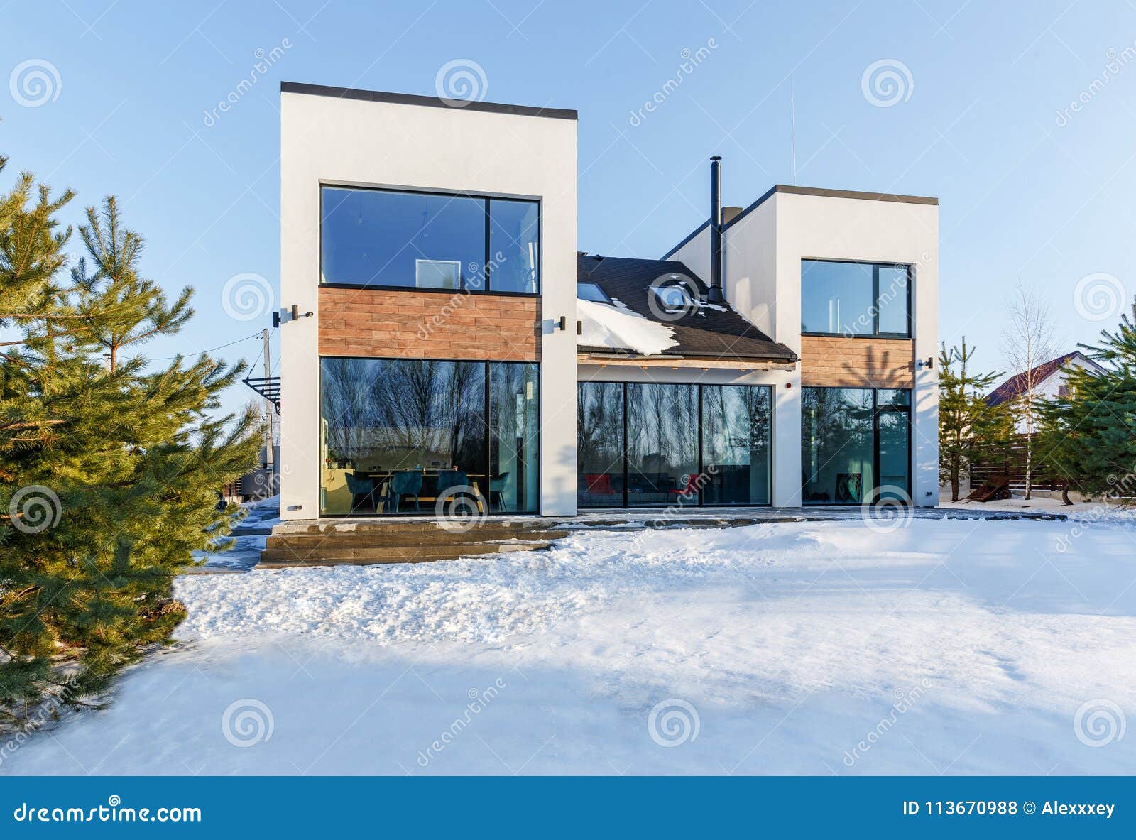 A Modern House with Large Panoramic Windows in the Background of Stock ...