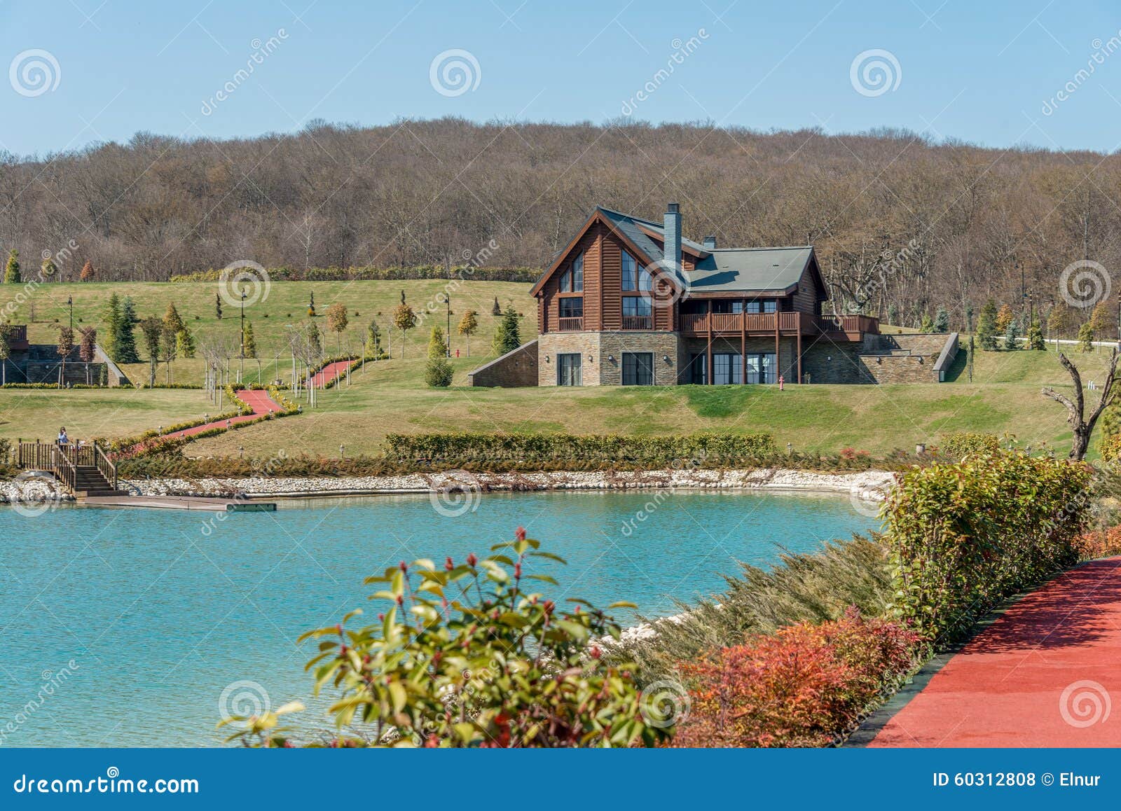 Modern House Near Water on Bright Day Stock Photo - Image of logs, pond ...