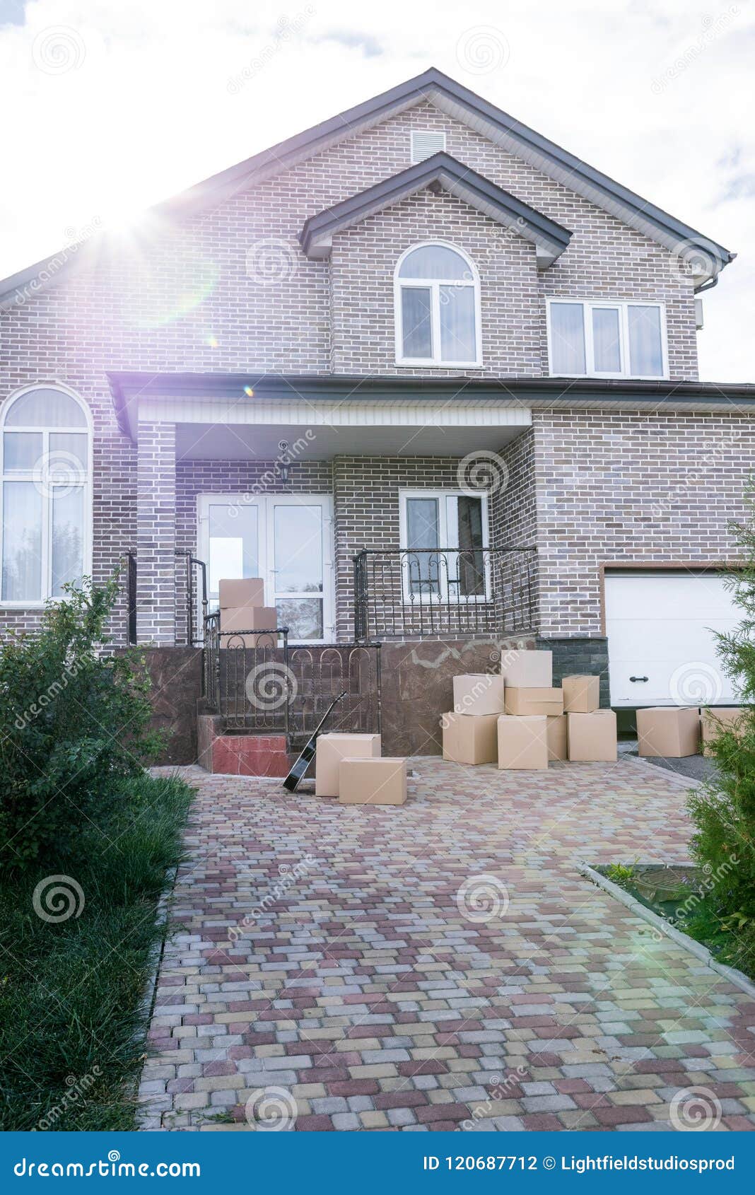 Modern House with Stacks of Cardboard Boxes Stock Photo - Image of ...