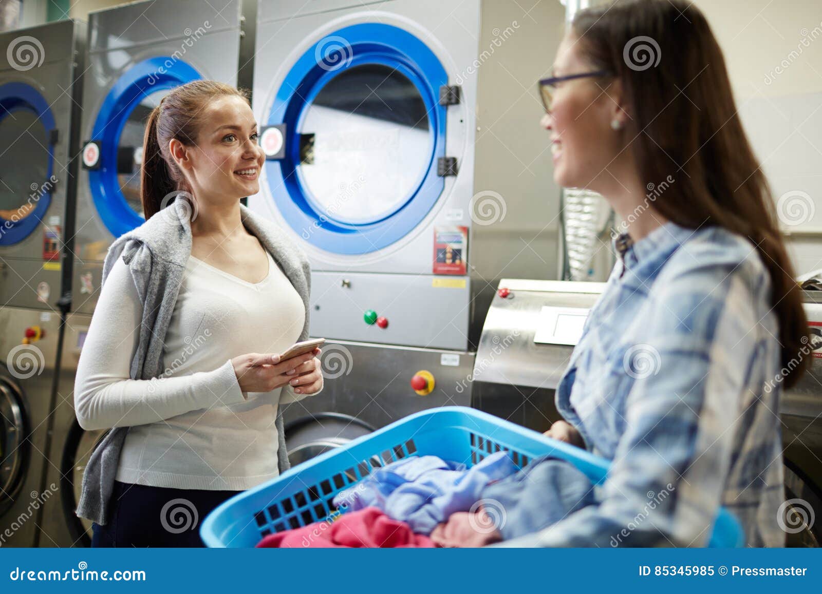 Modern housekeepers stock image. Image of friendly, washingmachine ...