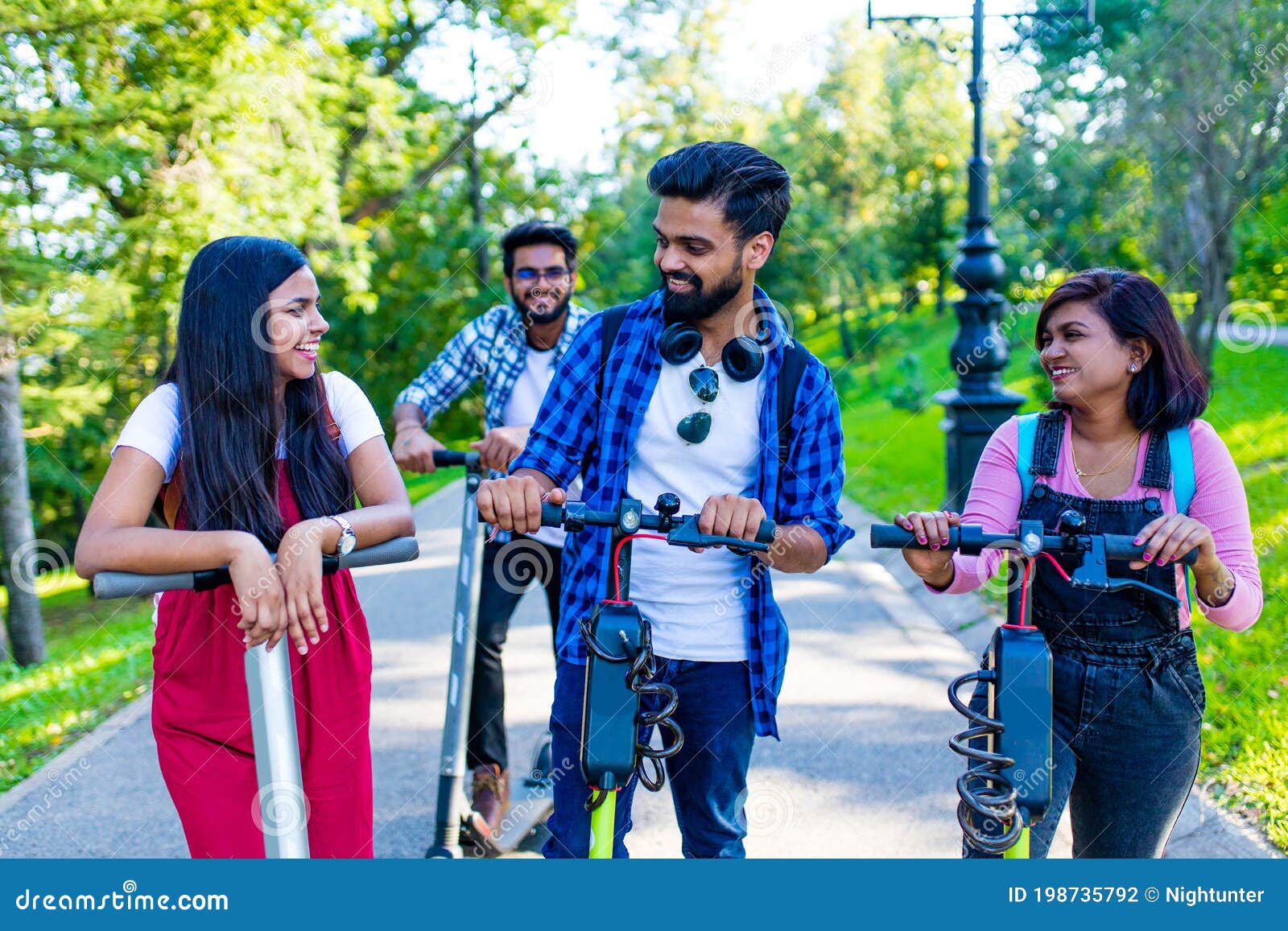 Modern Indian Friends Ride on Segway in Park in India Stock Photo ...