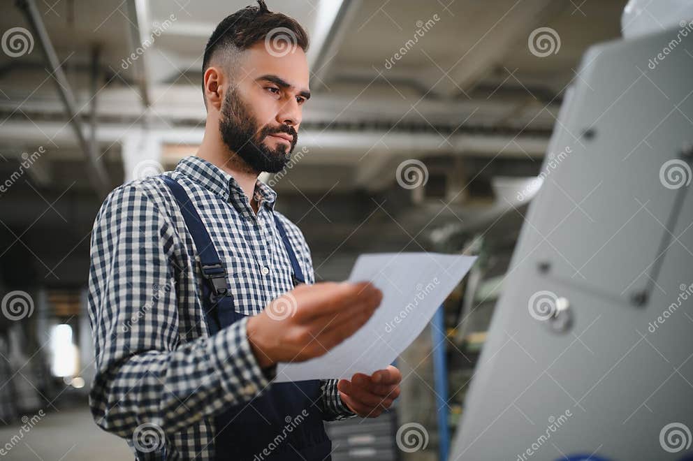 Modern Industrial Machine Operator Working in Factory Stock Photo ...