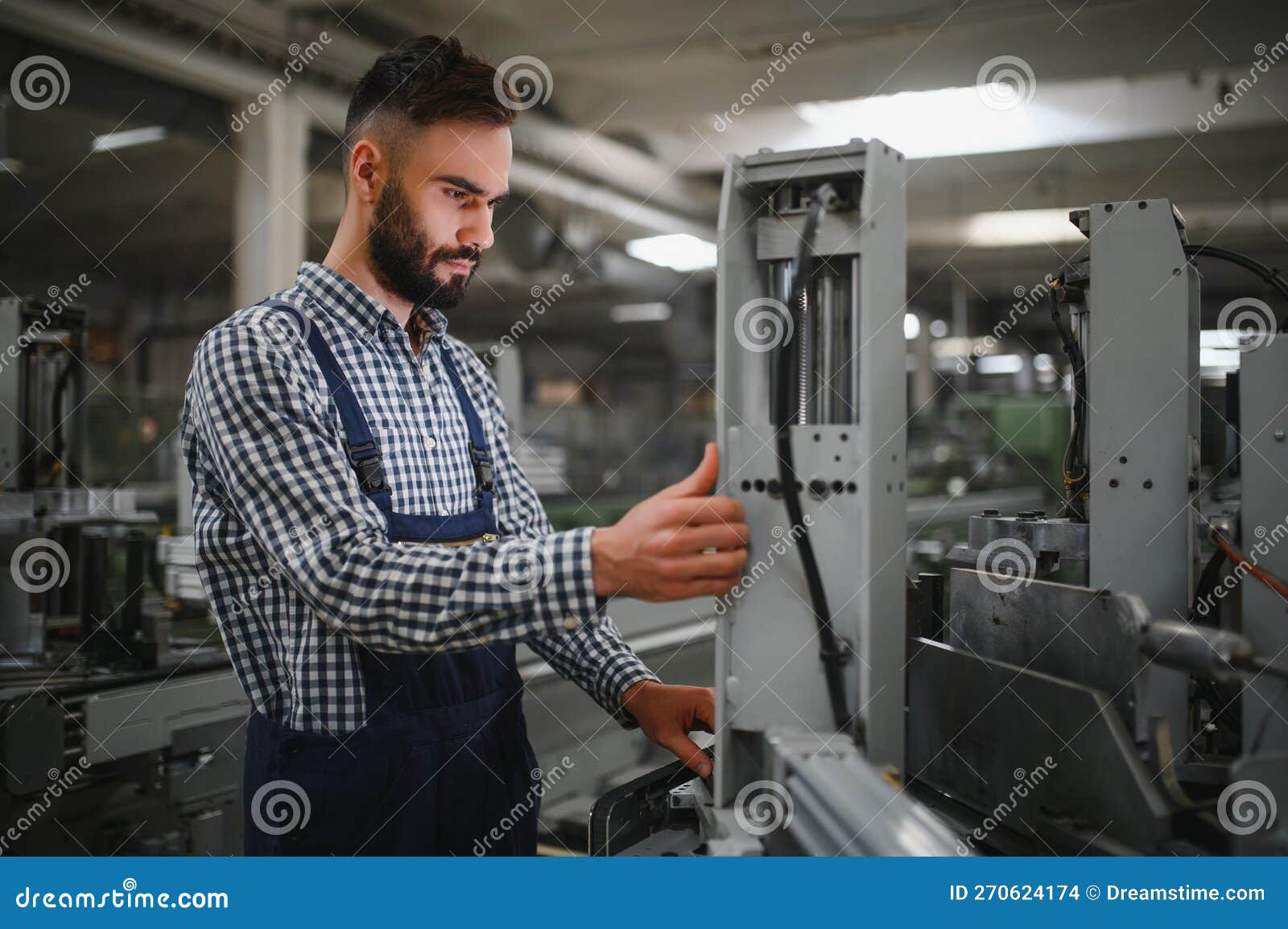 Modern Industrial Machine Operator Working in Factory Stock Photo ...