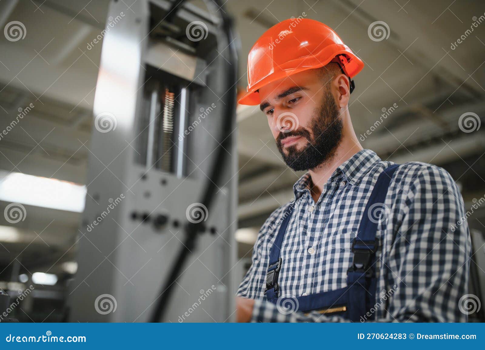 Modern Industrial Machine Operator Working in Factory Stock Image ...
