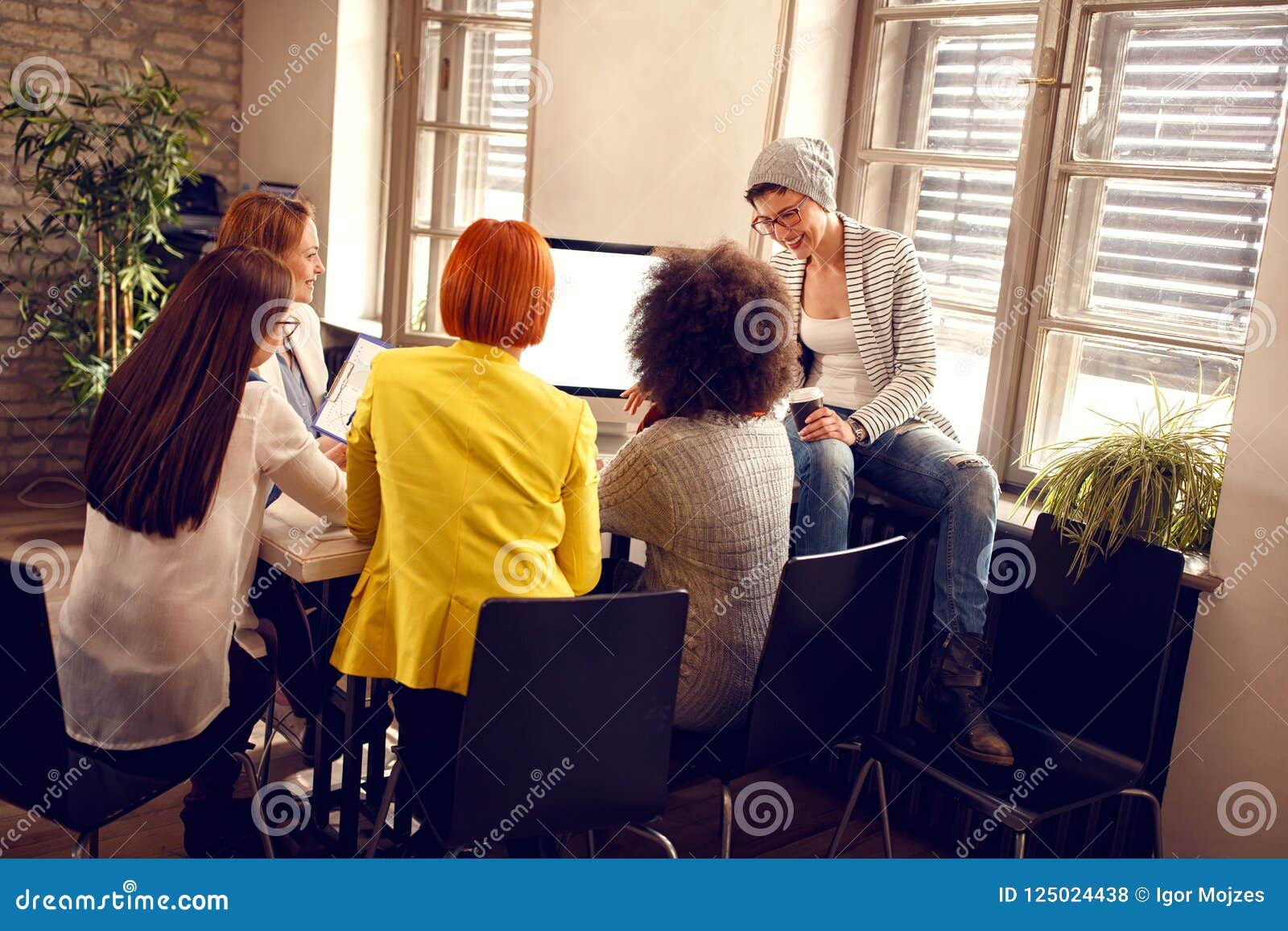 Modern Informal Working Team at Work on Computer Stock Photo - Image of ...