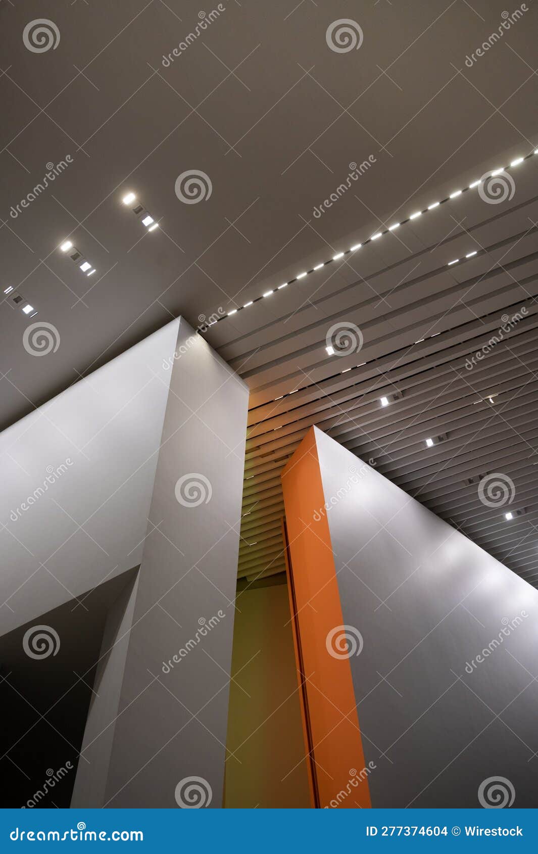Modern Interior of a Building Featuring a White Ceiling with Recessed ...