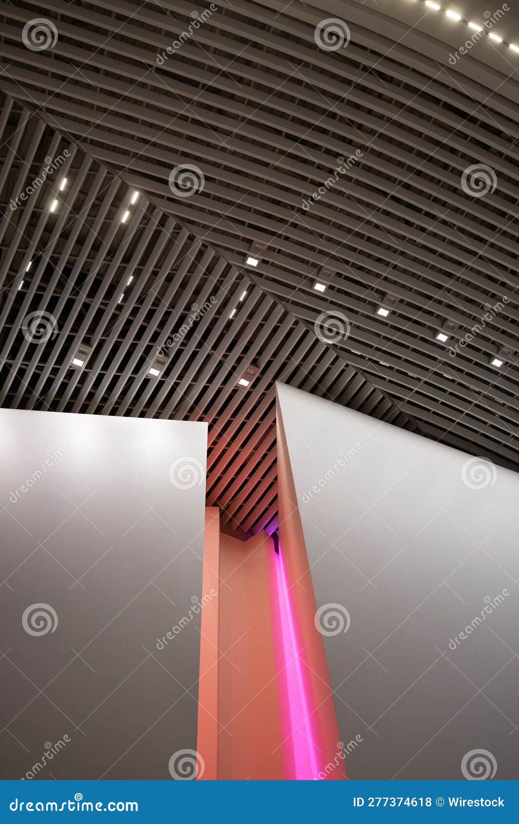 Modern Interior of a Building Featuring a White Ceiling with Recessed ...