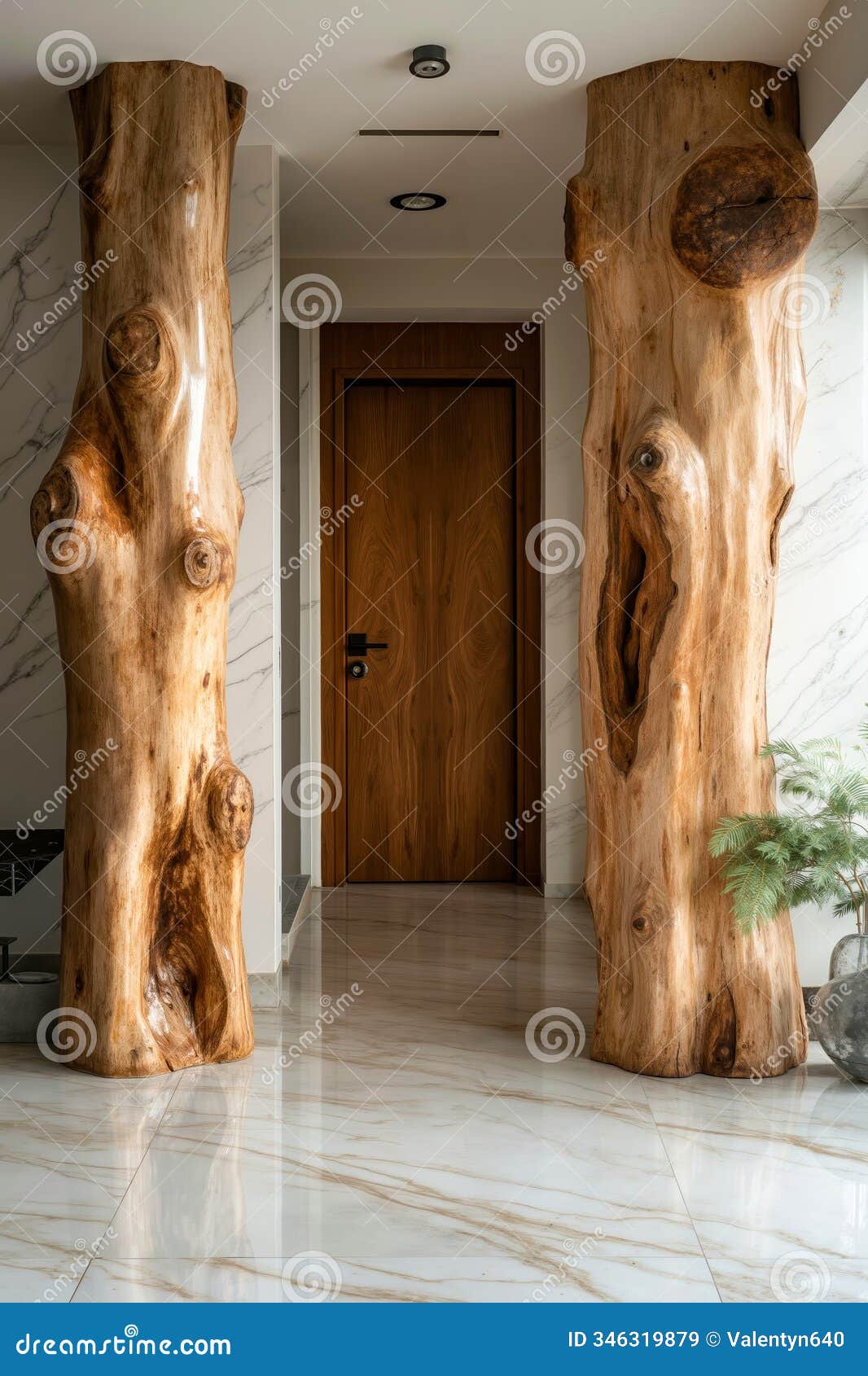 A Couple of Wooden Pillars in a Room with Marble Flooring Stock Image ...
