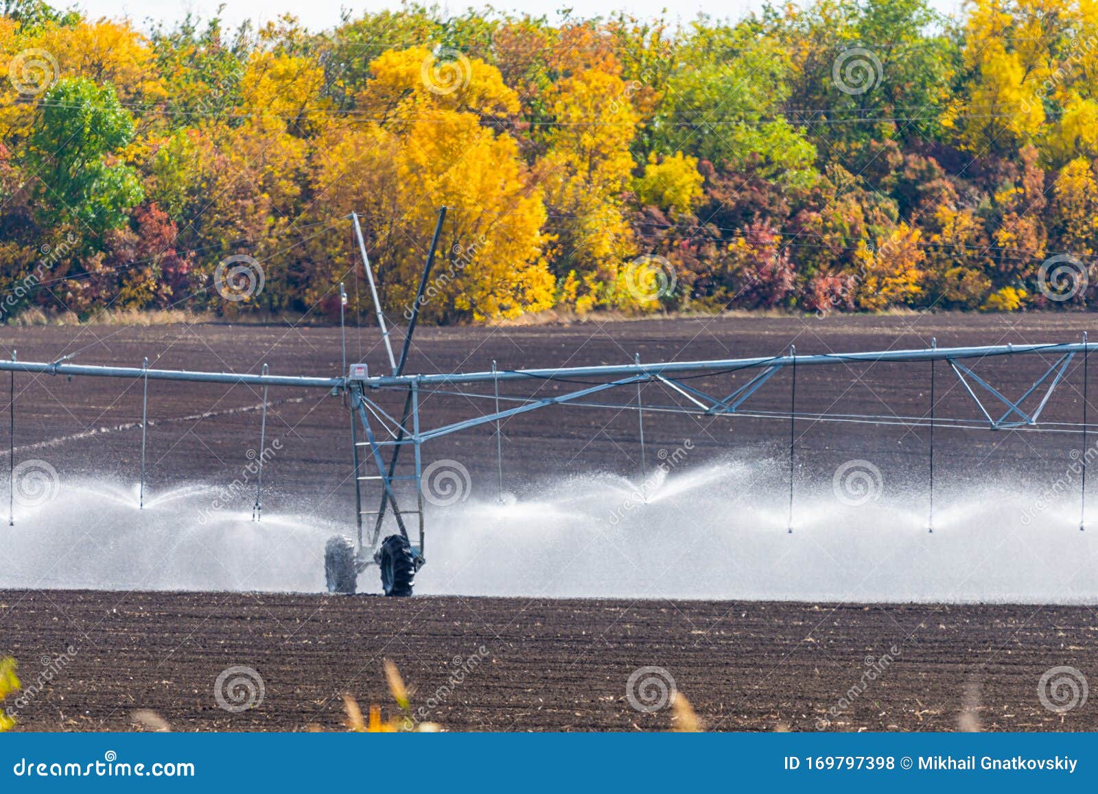 Modern Irrigation System Watering a Farm Field Stock Photo - Image of ...