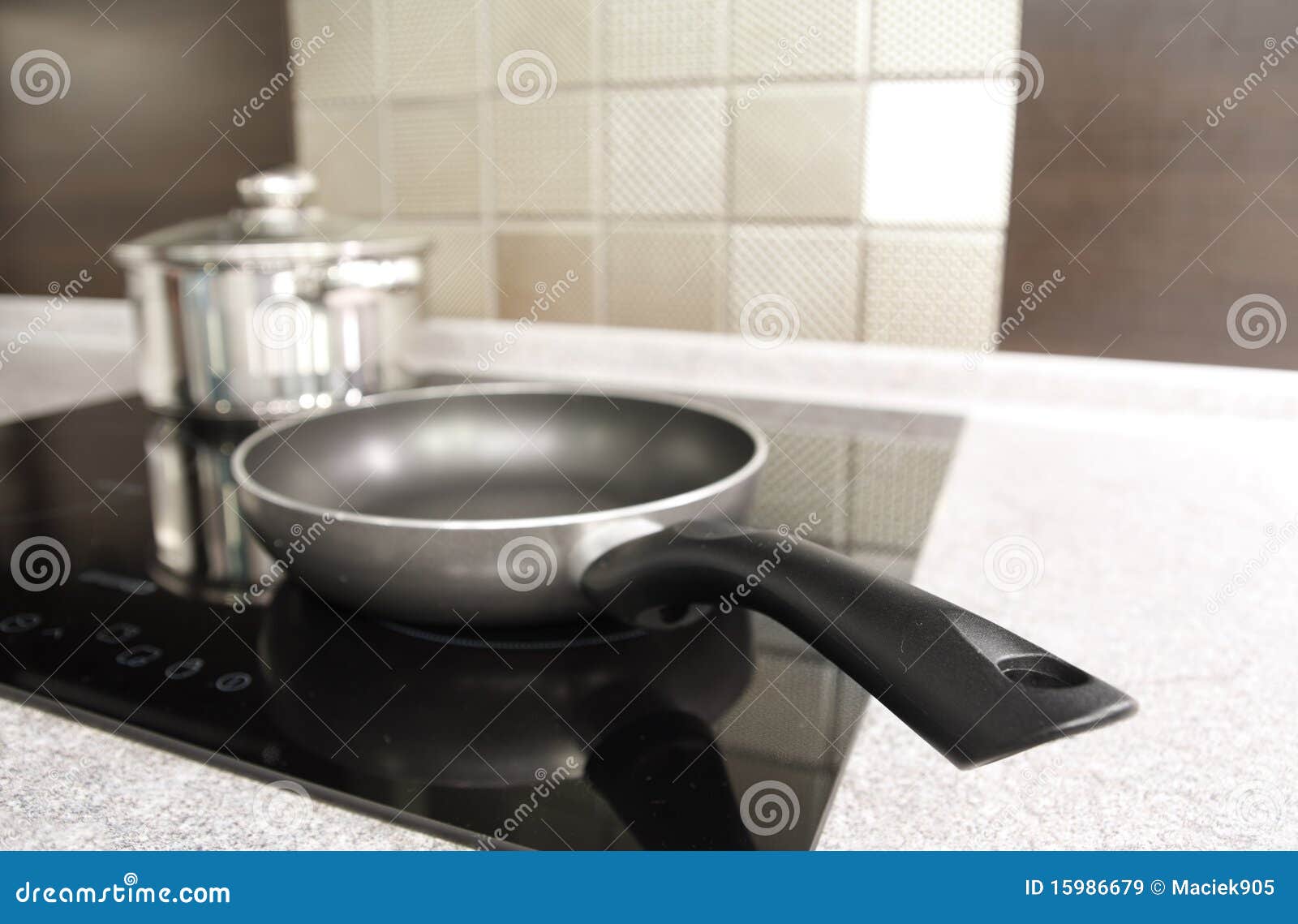 Modern Kitchen Appliances. Pot and Pan on a Cooker Stock Image - Image ...