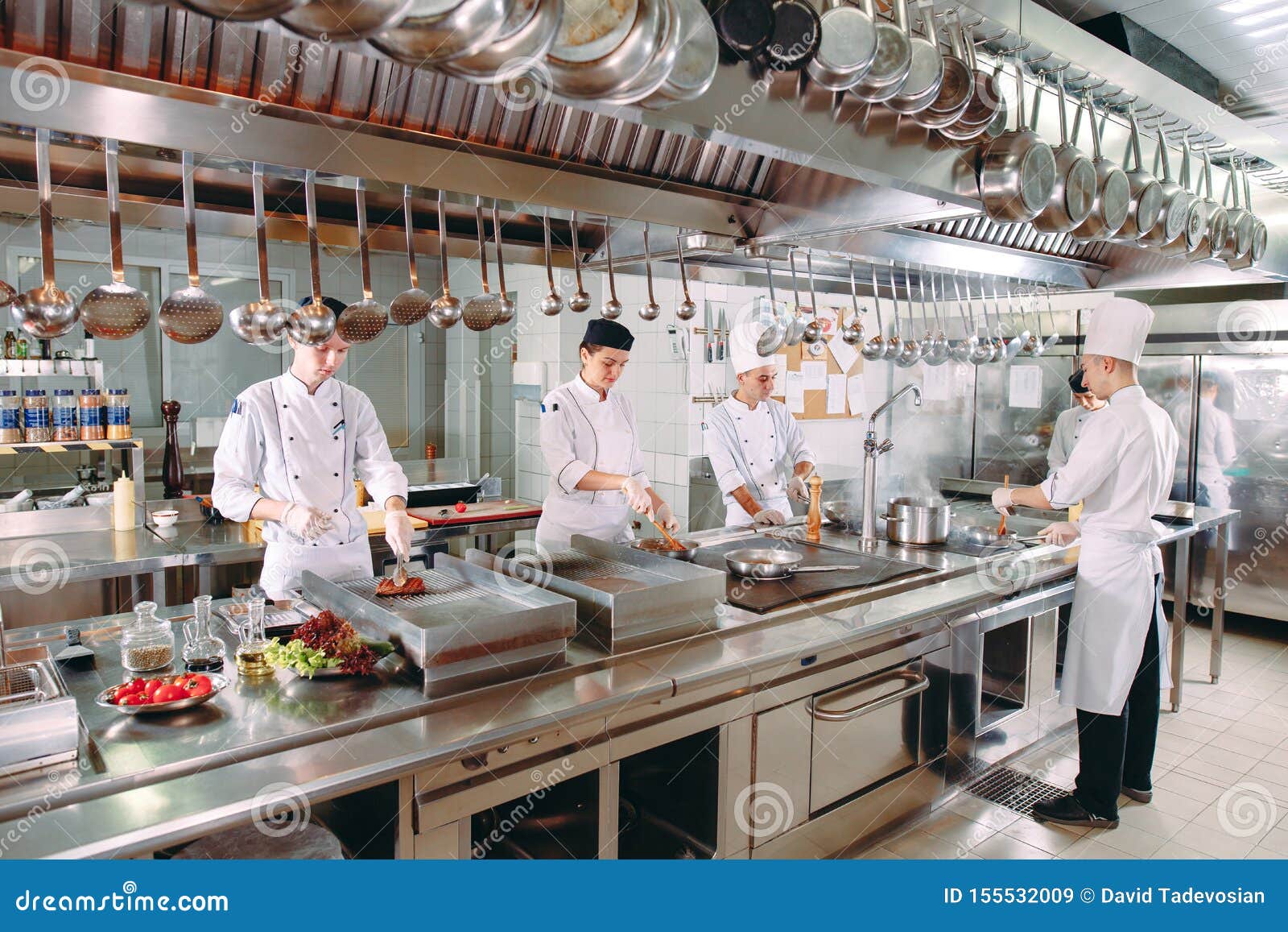 Modern Kitchen. the Chefs Prepare Meals in the Restaurant`s Kitchen ...