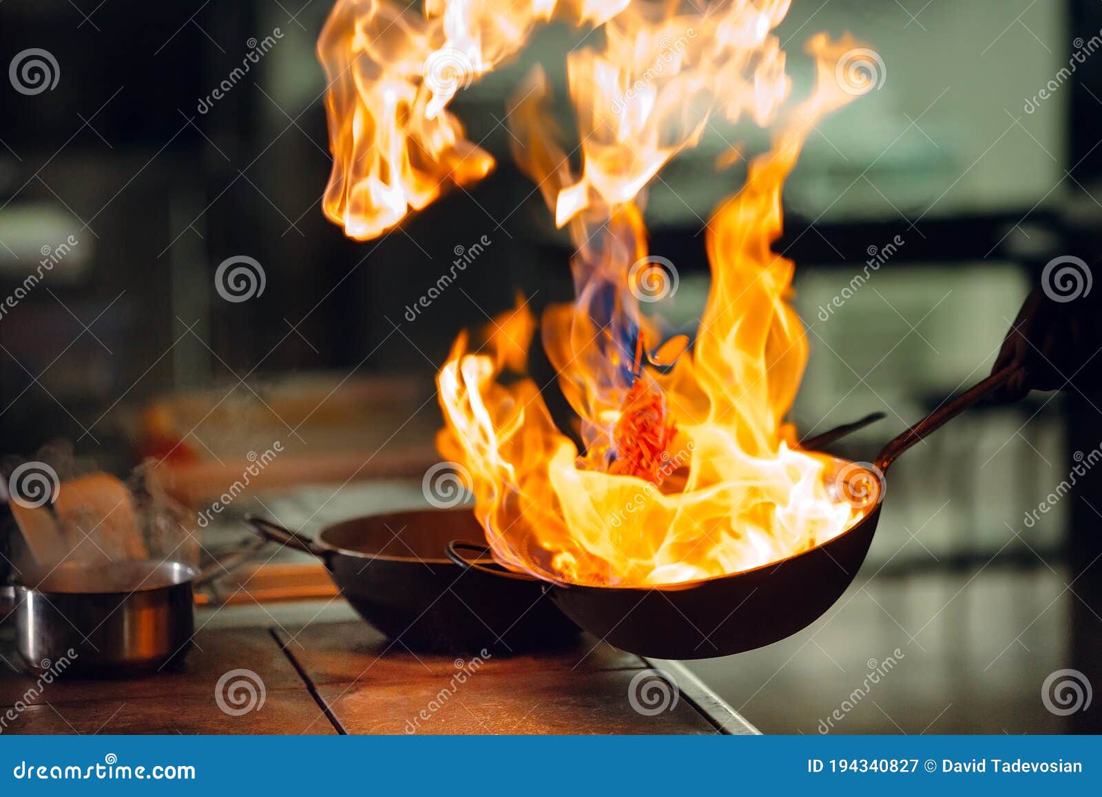 Modern Kitchen. Cooks Prepare Meals on the Stove in the Kitchen of the ...