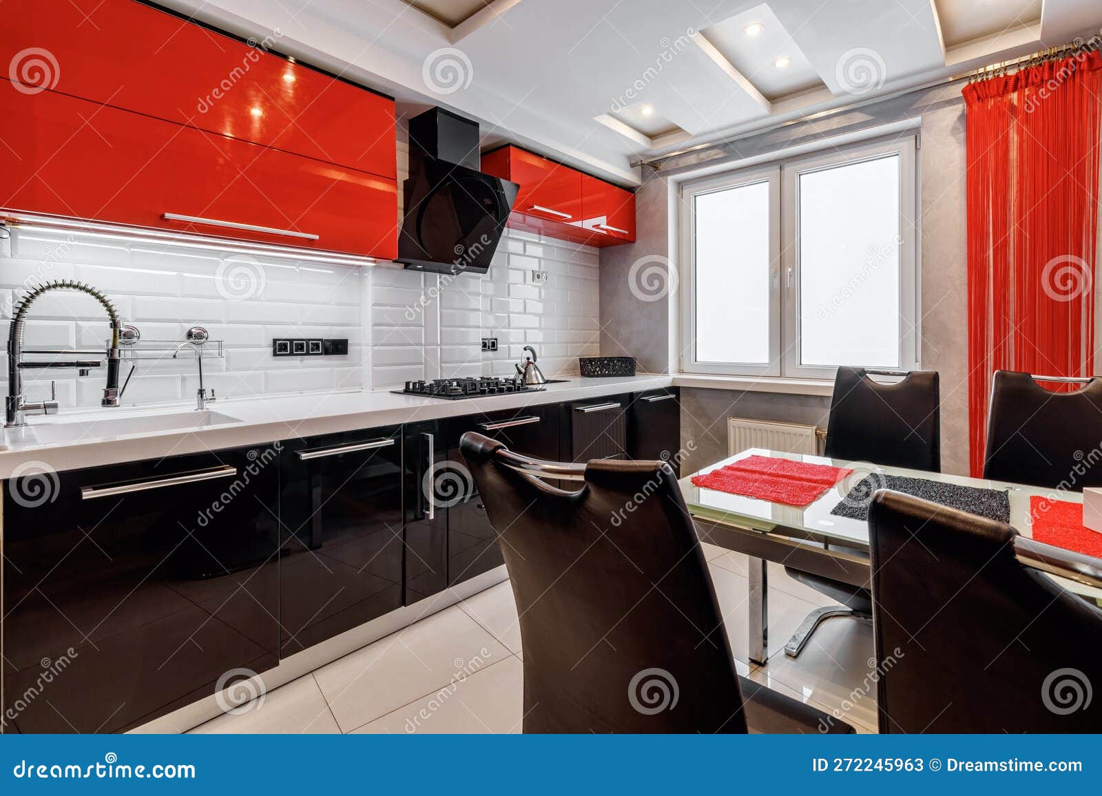 Modern Kitchen Interior with Red and Black Cabinets and White Ceramic ...