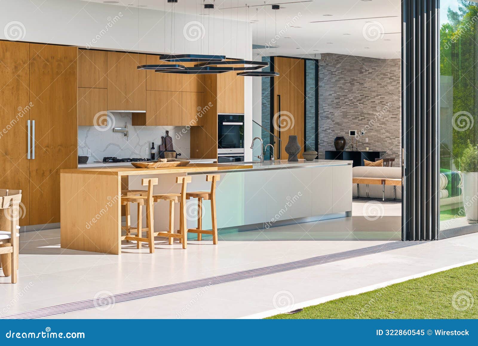 Modern Kitchen with an Island Table and Bar Stools Stock Image - Image ...