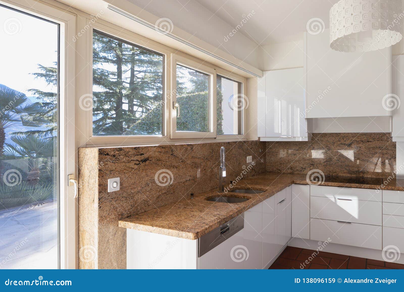 Modern Kitchen with Marble Top and Lake View Stock Image - Image of ...