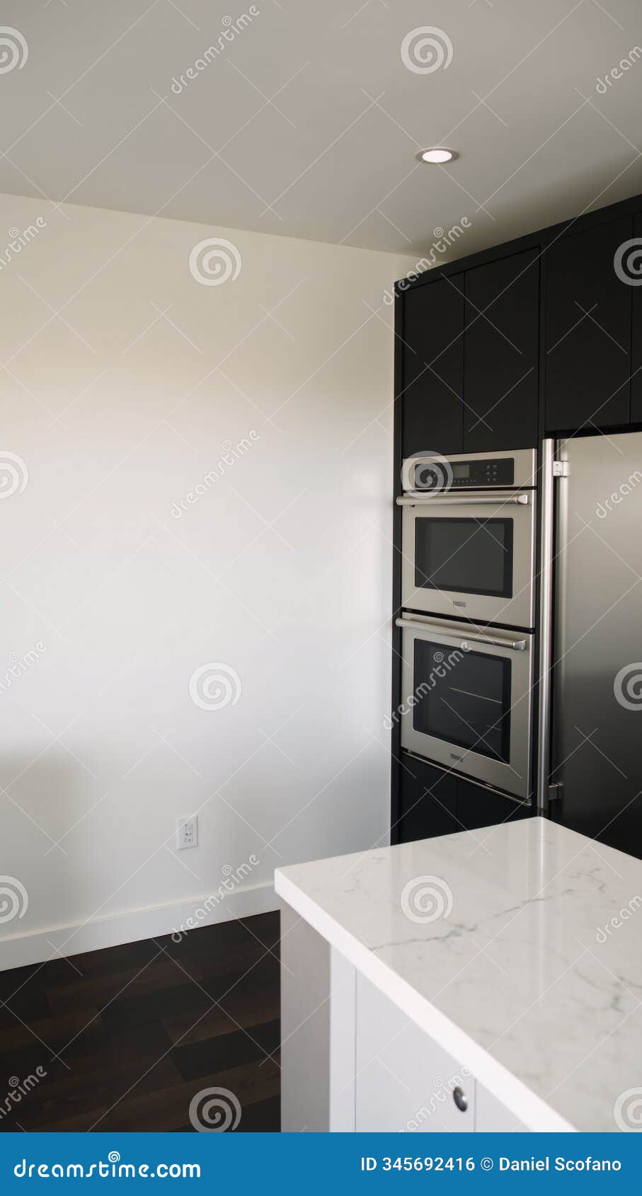 Modern Kitchen Scene Featuring an Empty White Wall on the Left Side ...